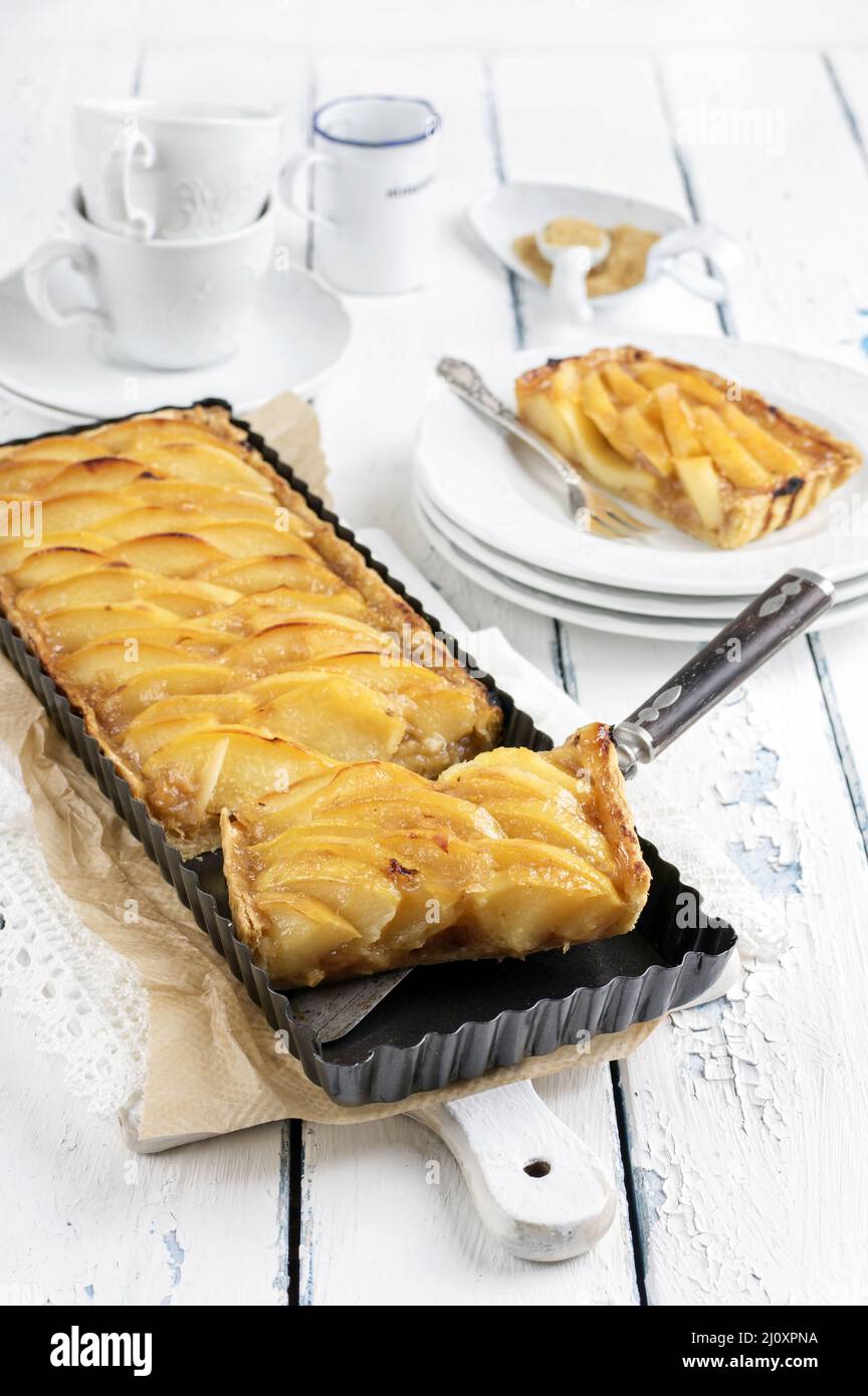 Traditional French quince tart served as close-up in classic backing ...