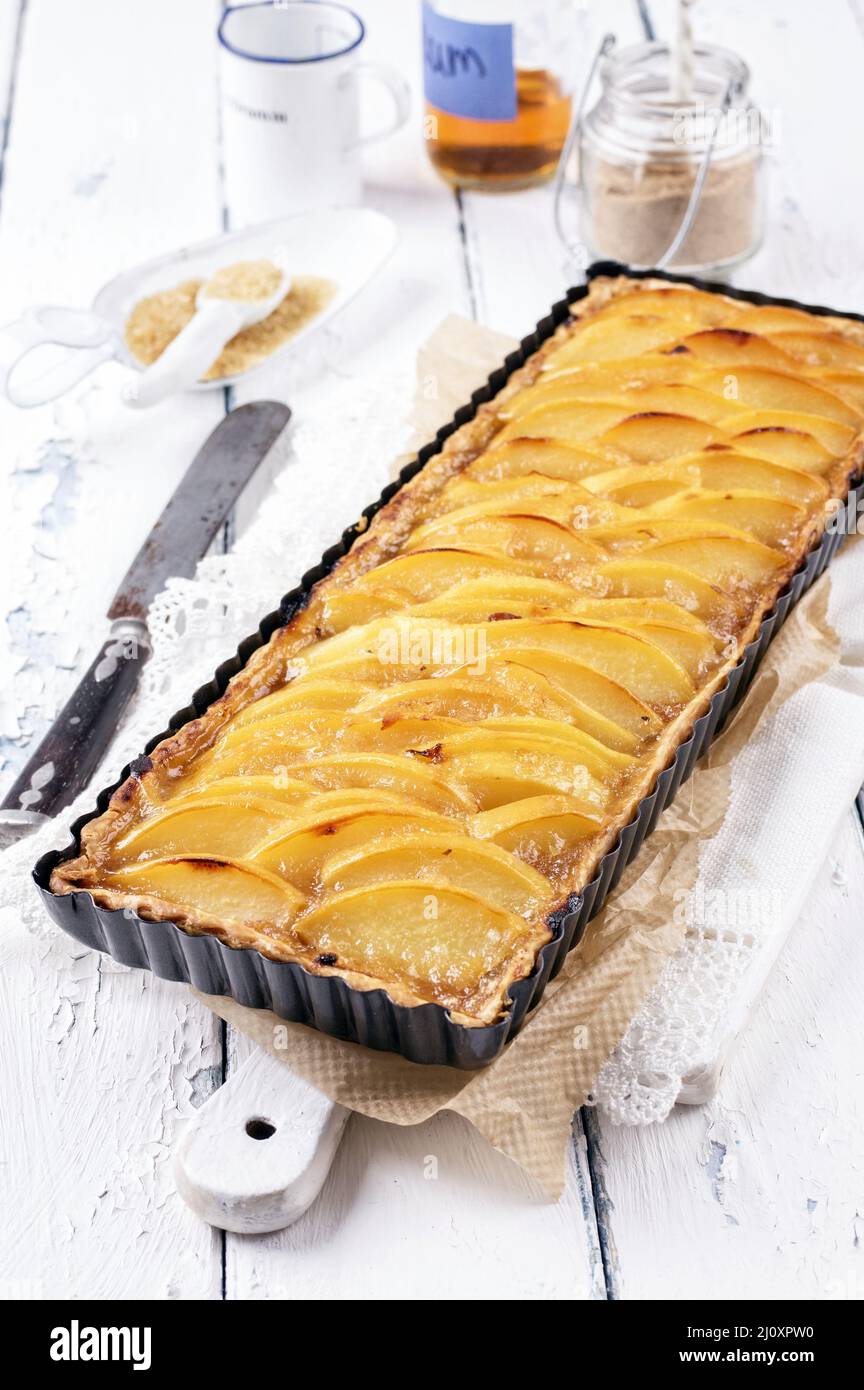 Traditional French quince tart served as close-up in classic backing ...