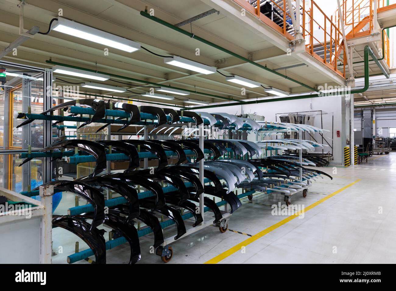 Photo of automobile production line. Welding car body and parts. Modern ...