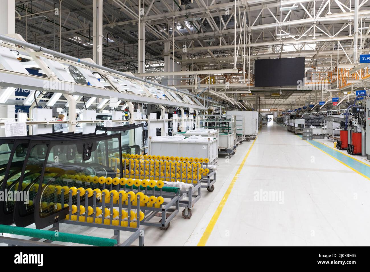 Photo of automobile production line. Welding car body. Modern car ...