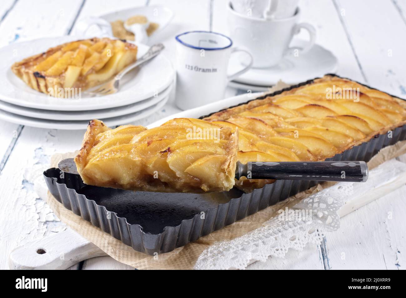 Traditional French quince tart served as close-up in classic backing ...