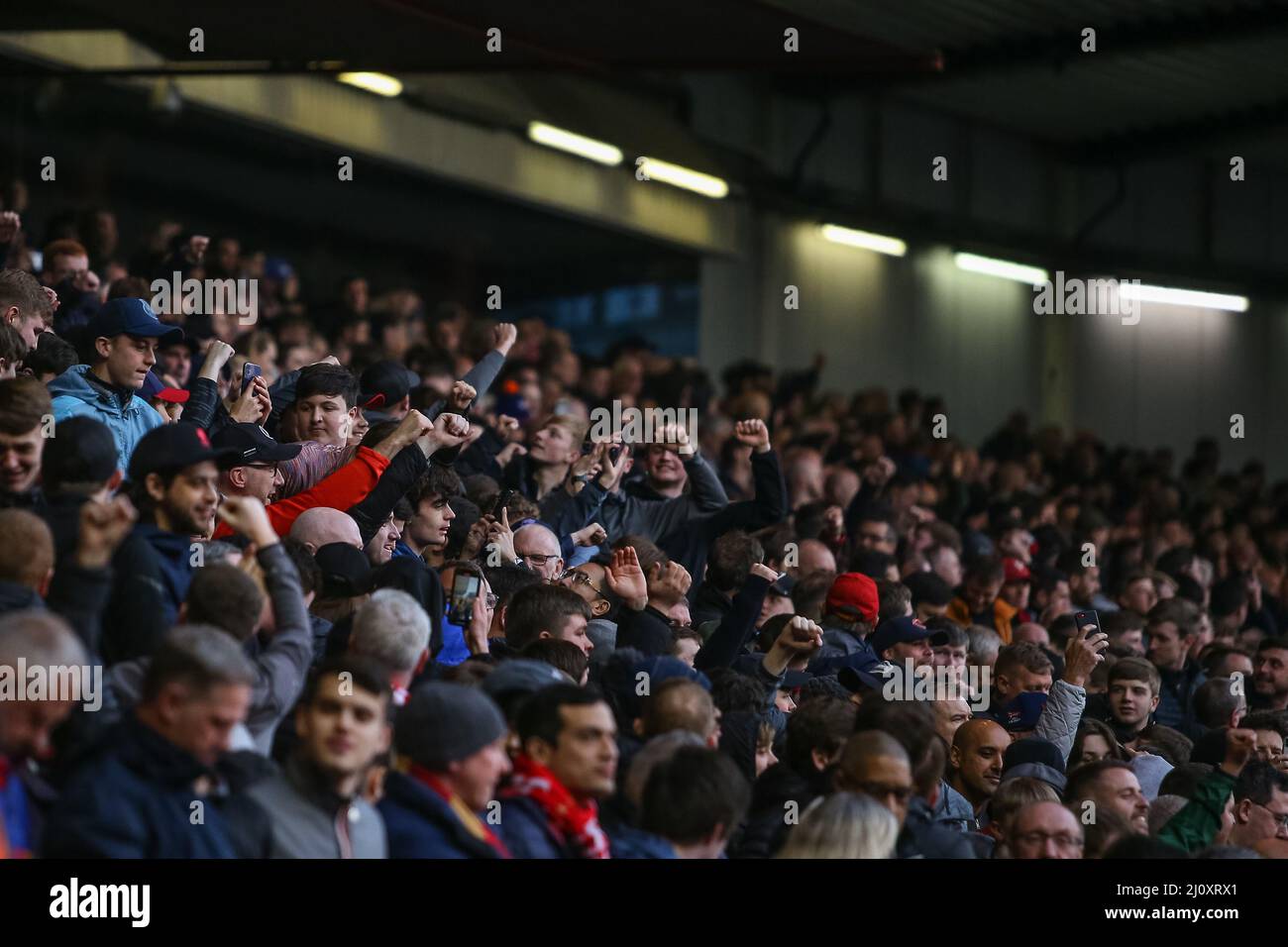 Liverpool fans in fine voice before kick off Stock Photo - Alamy