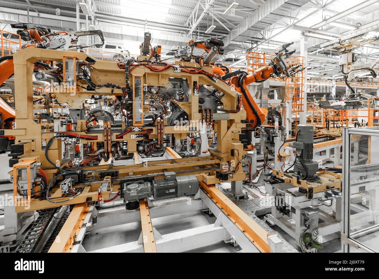 Photo of automobile production line. Welding car body. Modern car ...