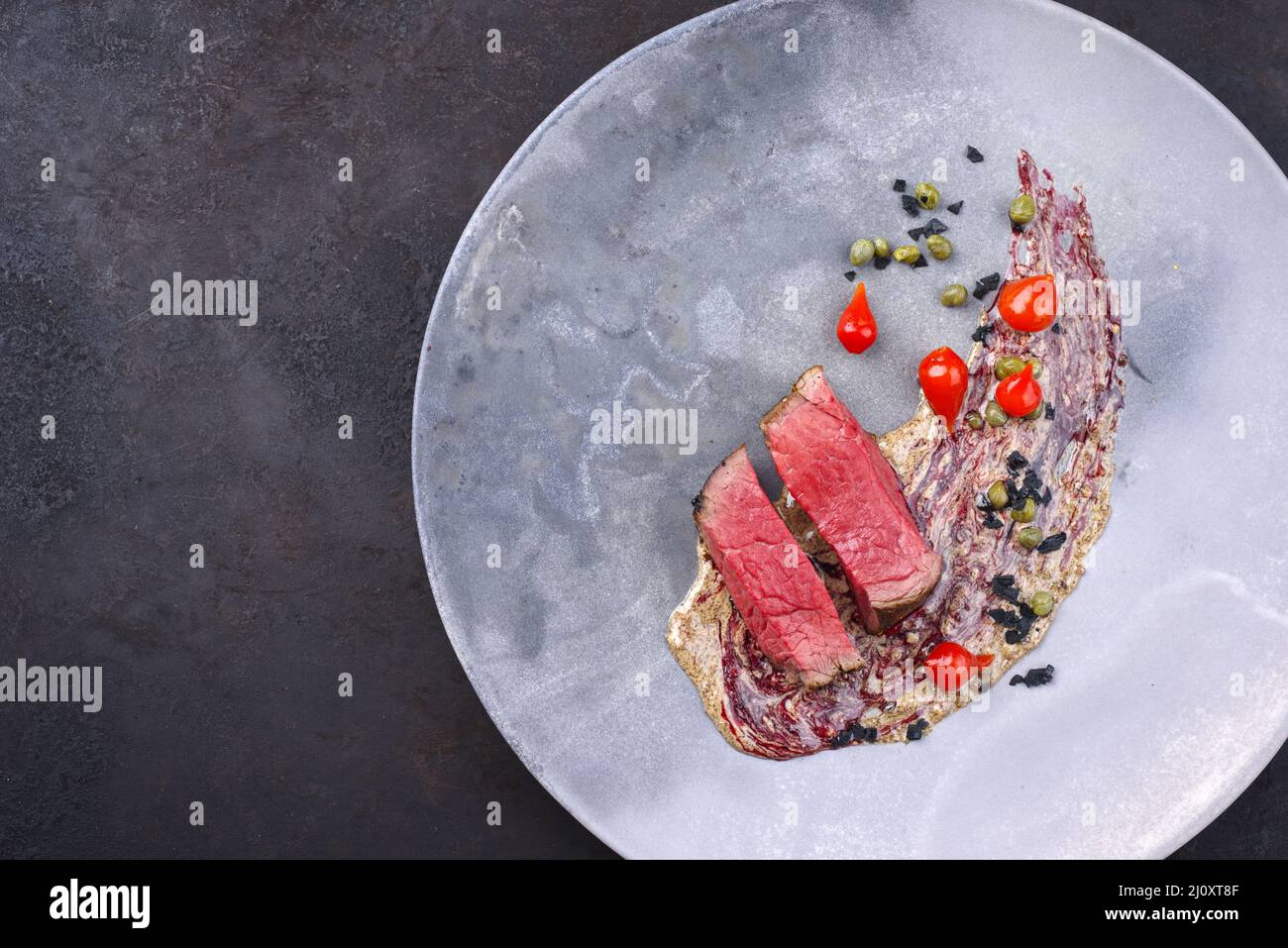 Modern style traditional fried dry aged angus beef tenderloin steak ...