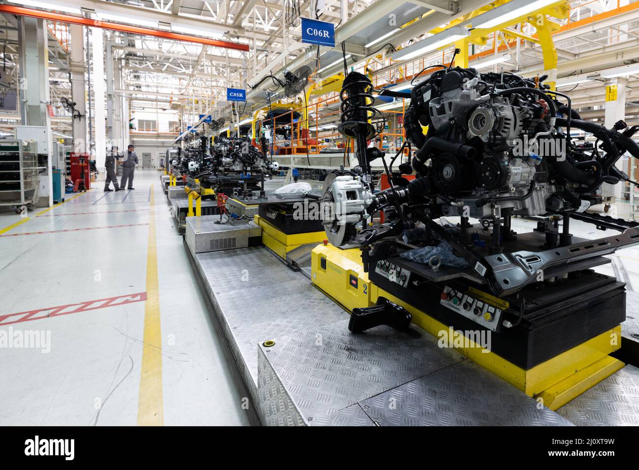 Photo of car bodies are on assembly line. Factory for production of ...
