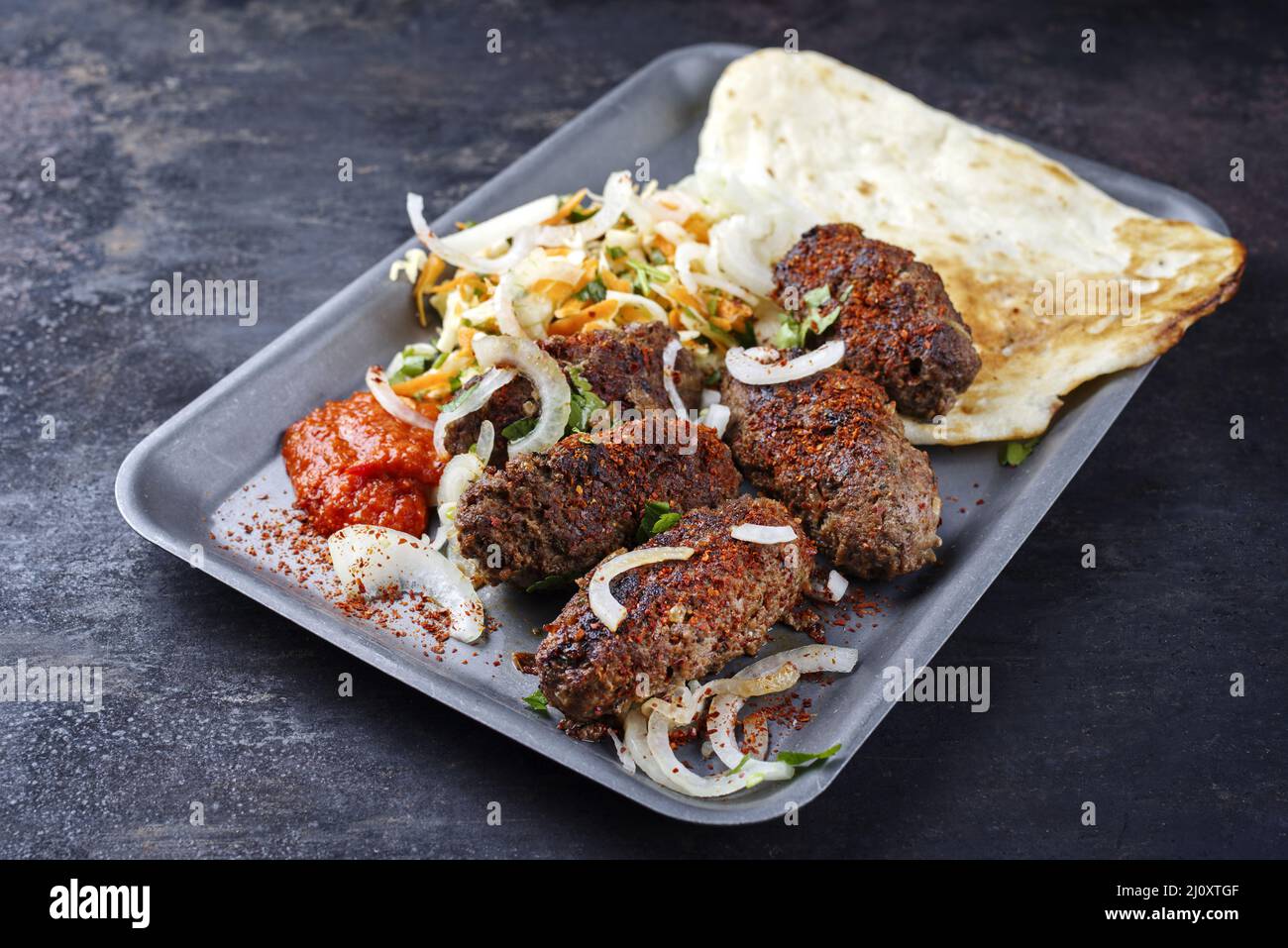 Traditional Croatian cevapi spicy meat ball rolls with cabbage carrot ...