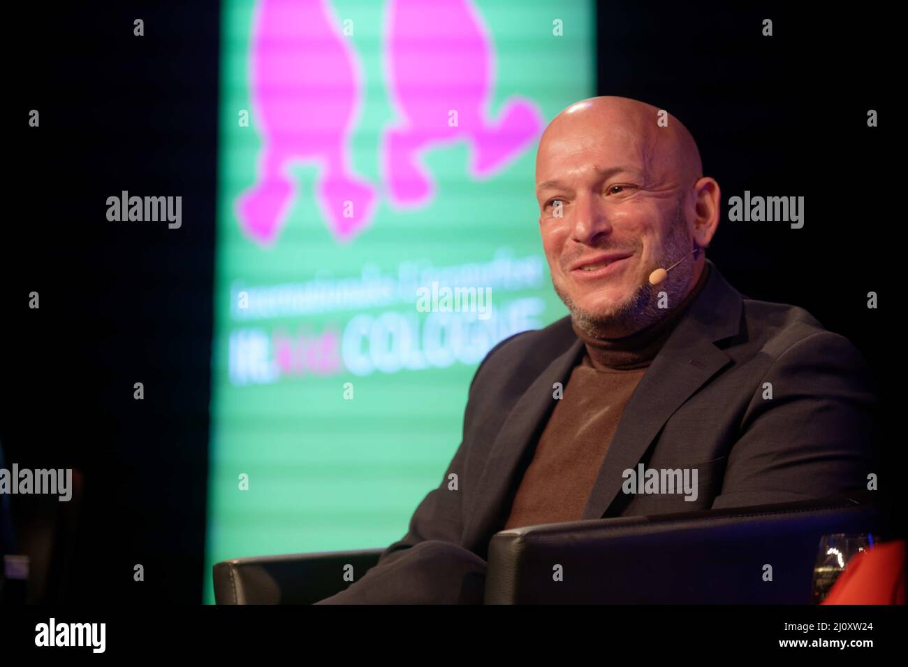Cologne, Germany. 18th Mar, 2022. Author Dror Mishani sits on stage at ...