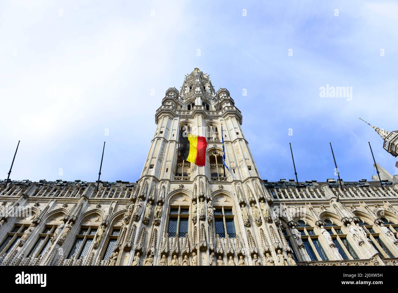 The iconic Medieval town hall building in the Grand Place in Brussels ...
