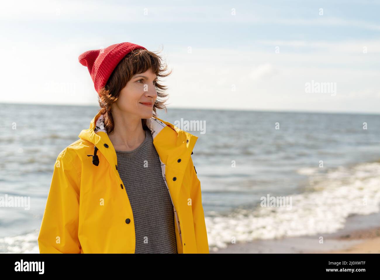 Yellow cloak hi-res stock photography and images - Alamy