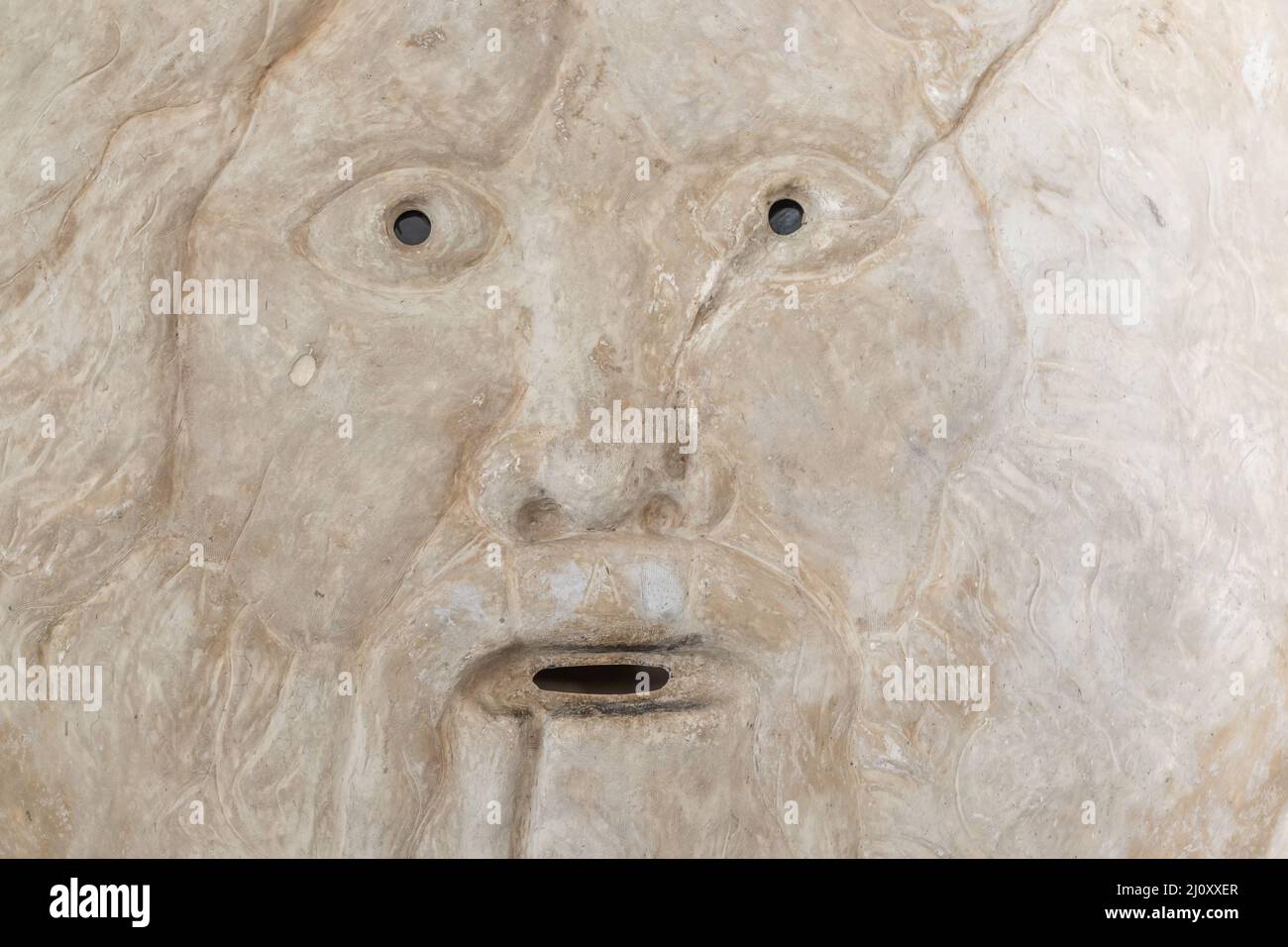 Mouth of truth sightseeing in Rome, Italy. Historical sculpture made of ...