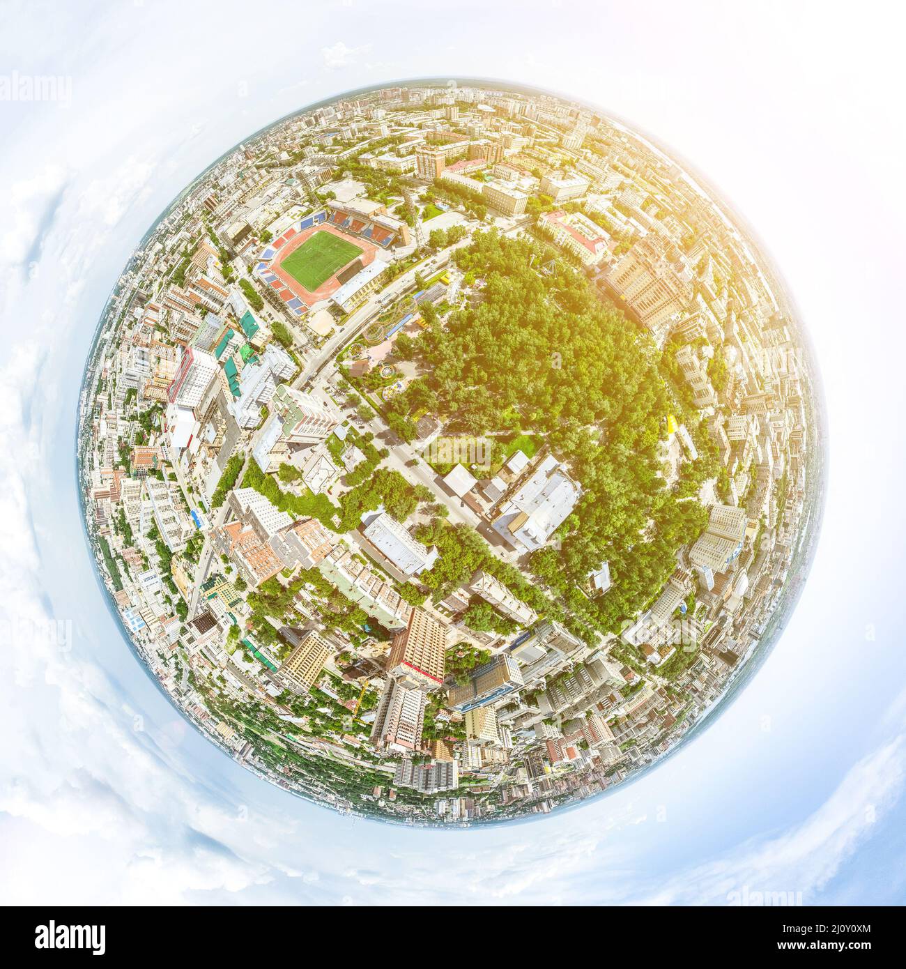 Aerial city view with crossroads and roads, houses, buildings, parks ...