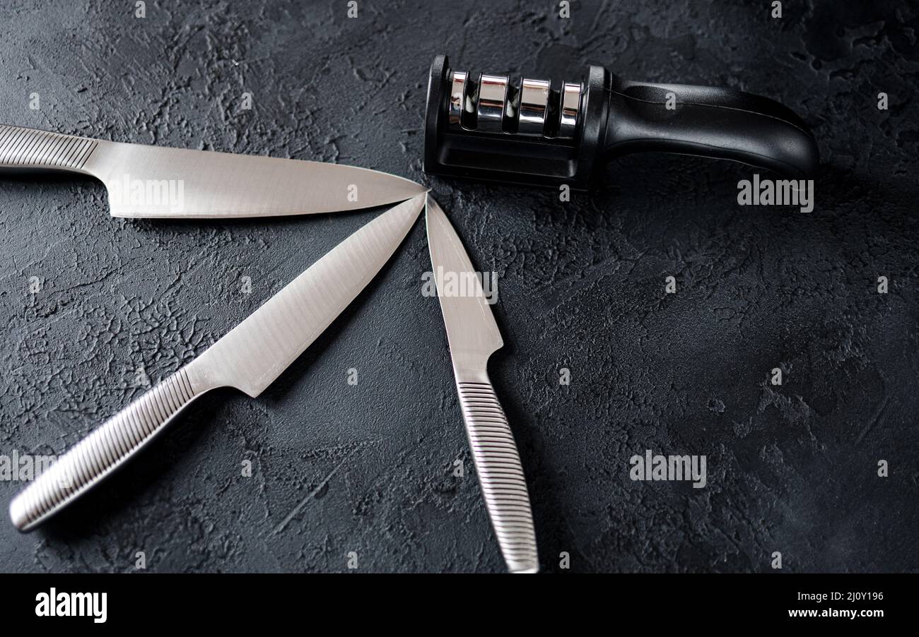 Sharpening knife rustic hi-res stock photography and images - Alamy