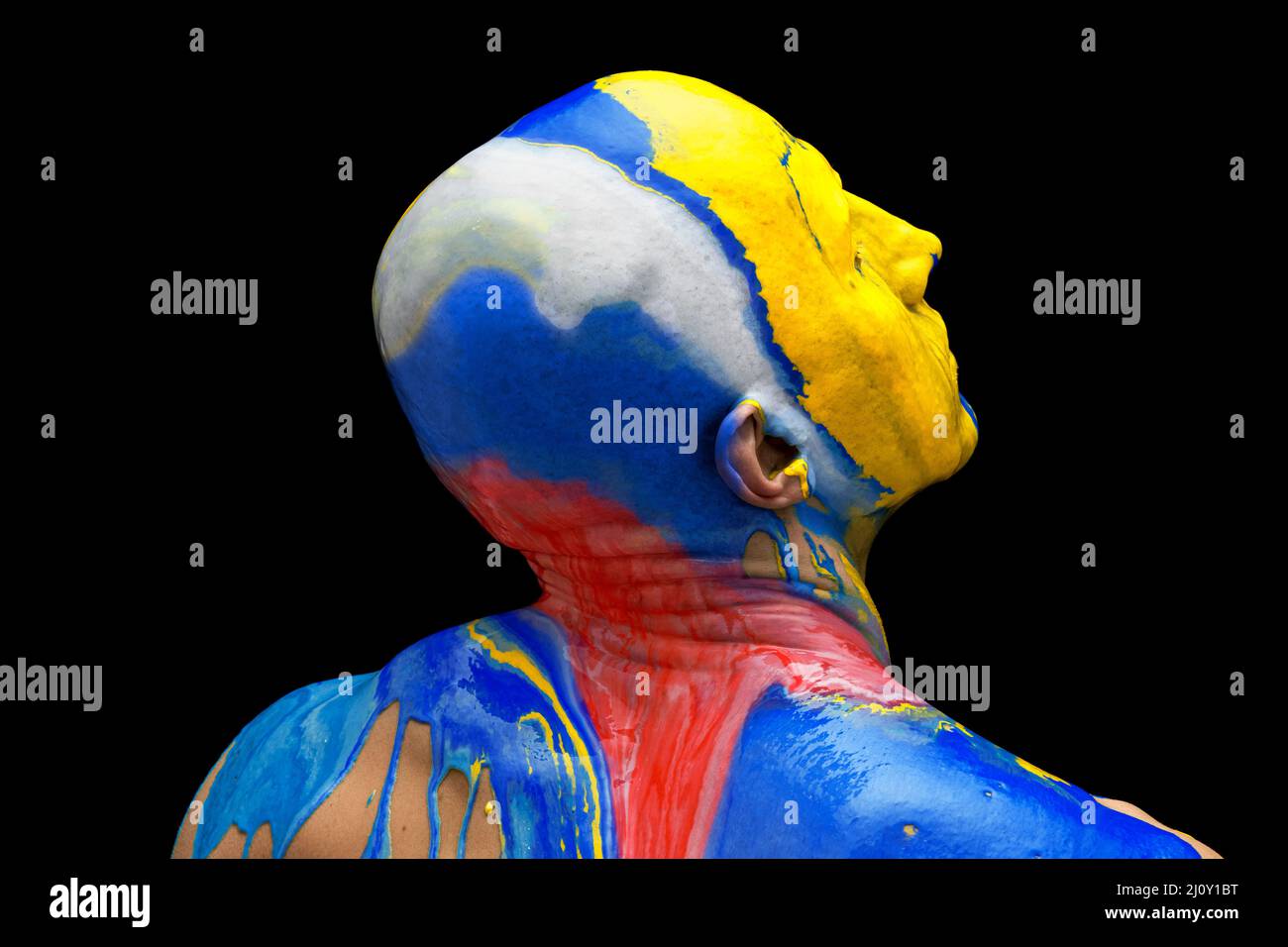 Conceptual image. Male head and shoulders covered with blue, white, red ...