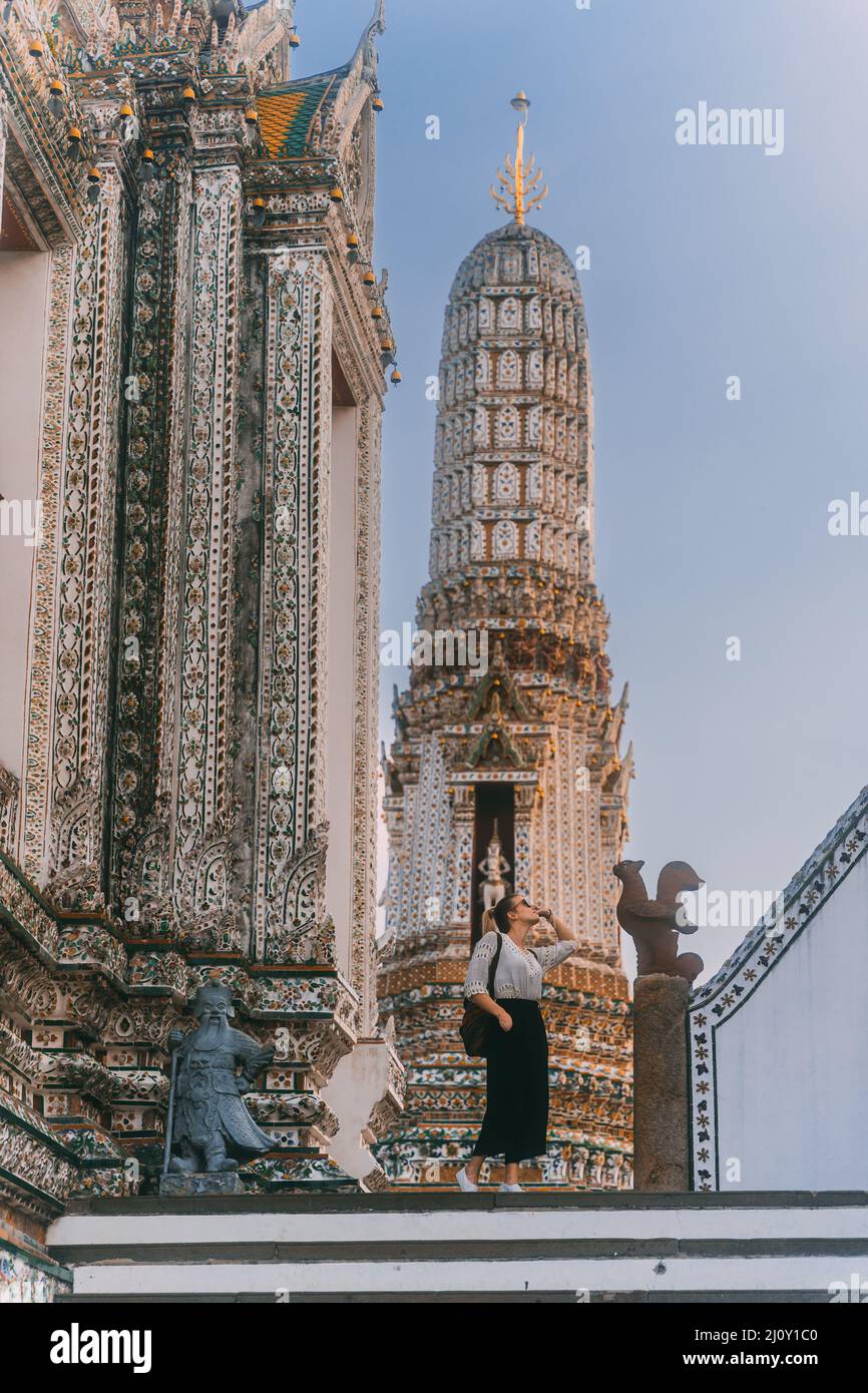 Young female in the temple of Wat Phra Chetuphon Wimon Mangalaram or ...