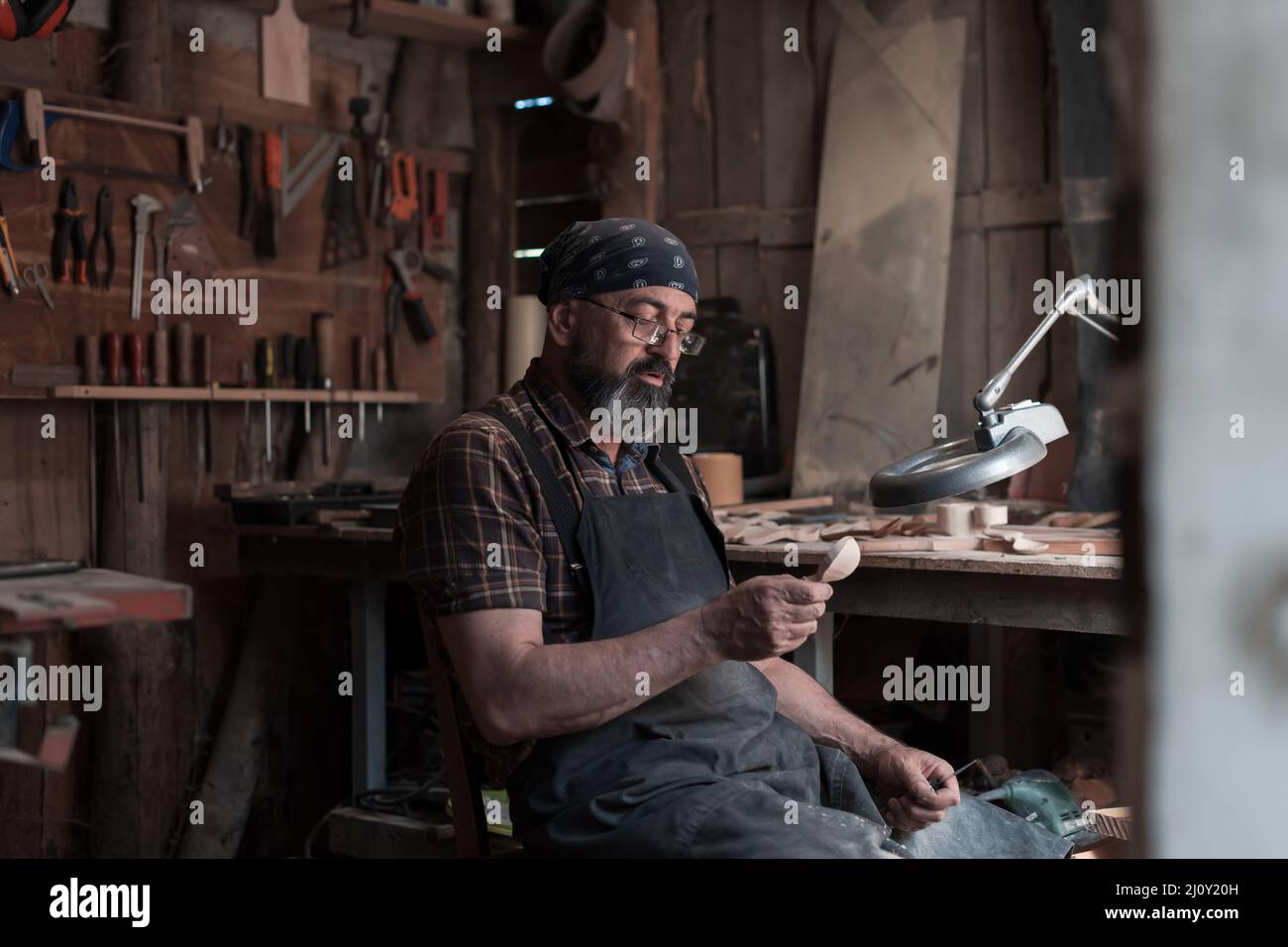 Carpenter making wooden spoon hi-res stock photography and images - Alamy