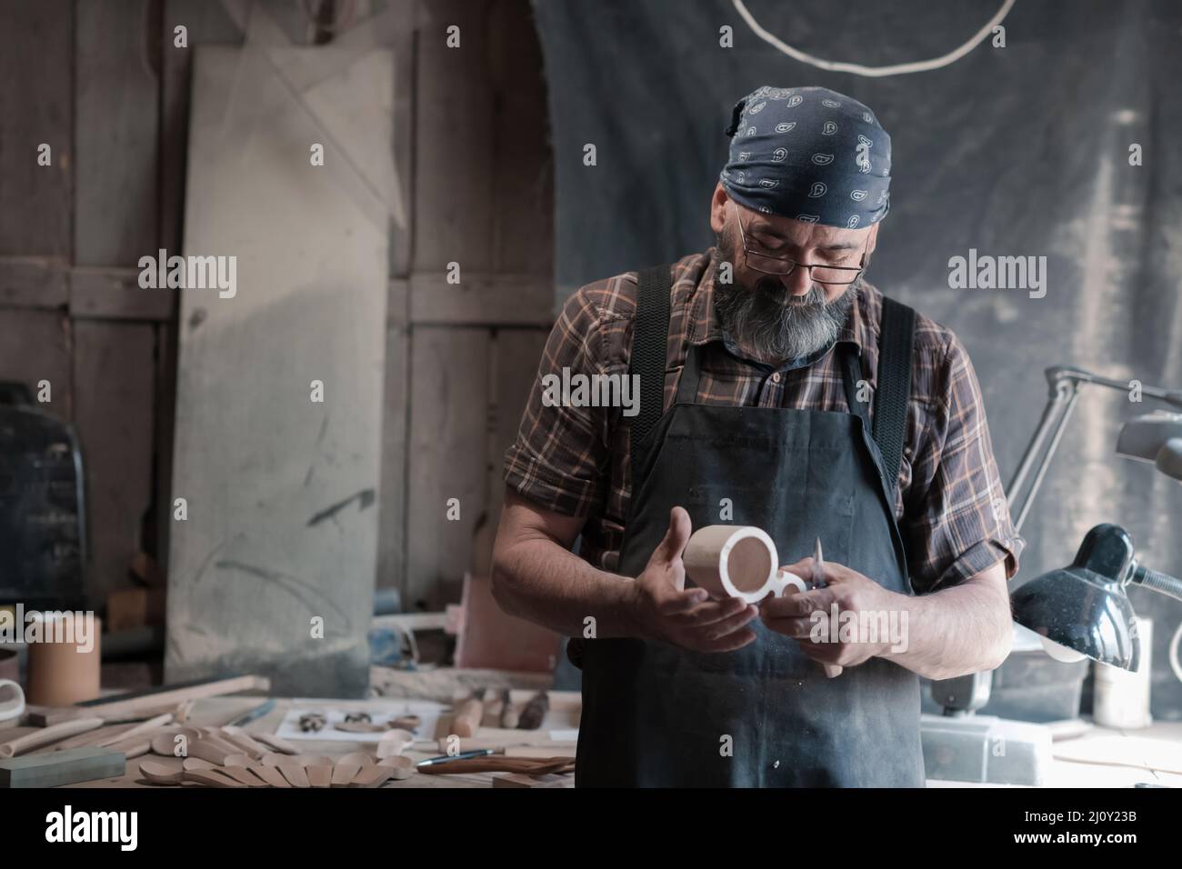 Carpenter making wooden spoon hi-res stock photography and images - Alamy