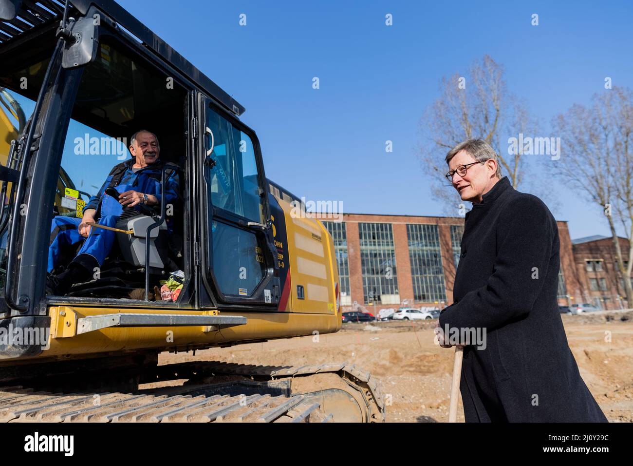 Cologne, Germany. 21st Mar, 2022. Cardinal Rainer Maria Woelki (r ...