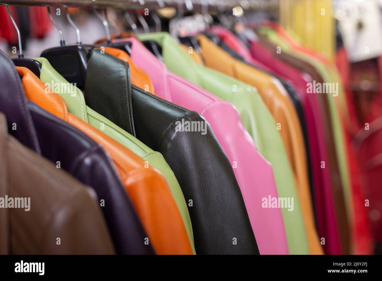 Collection of leather jackets in shop Stock Photo - Alamy