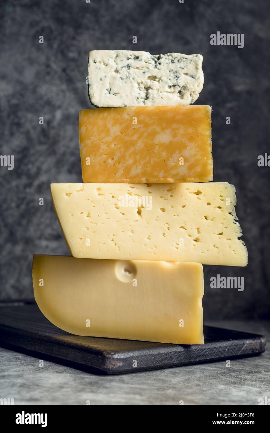 Delicious pile cheese top each other Stock Photo - Alamy
