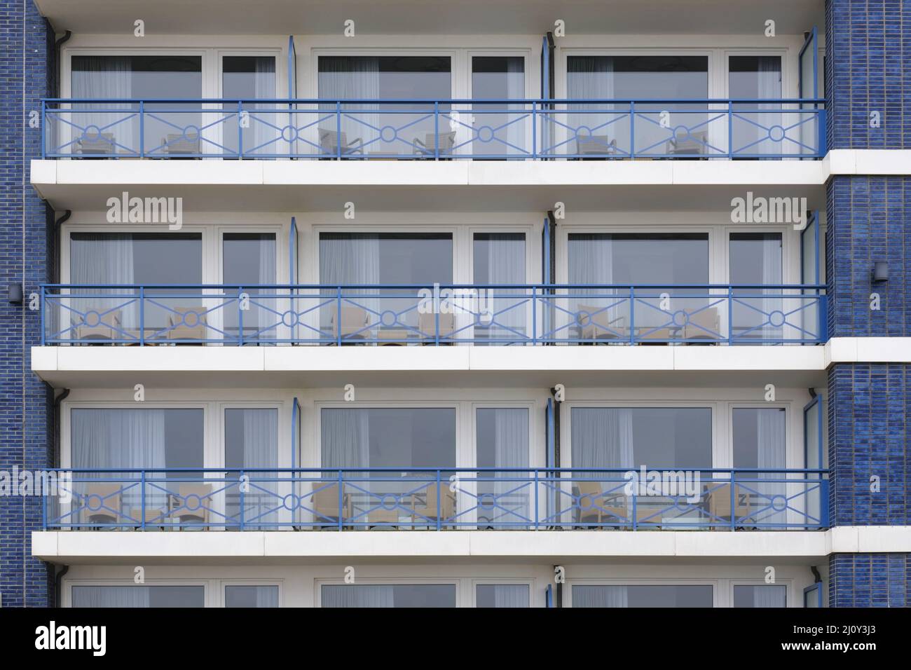 Facade of a Hotel with balcony Stock Photo - Alamy