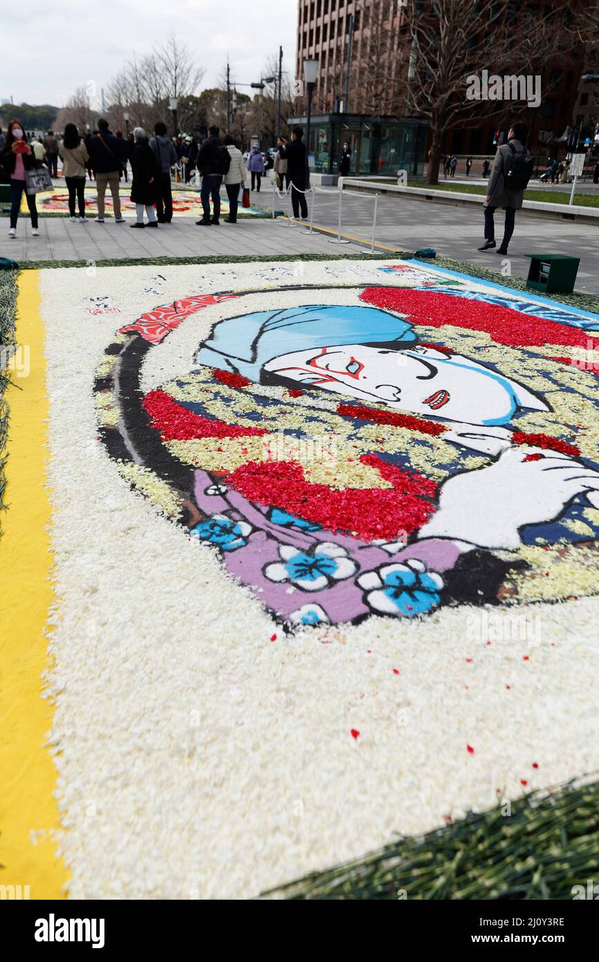 Tokyo, Japan. 21st Mar, 2022. A huge kabuki actor picture made with ...