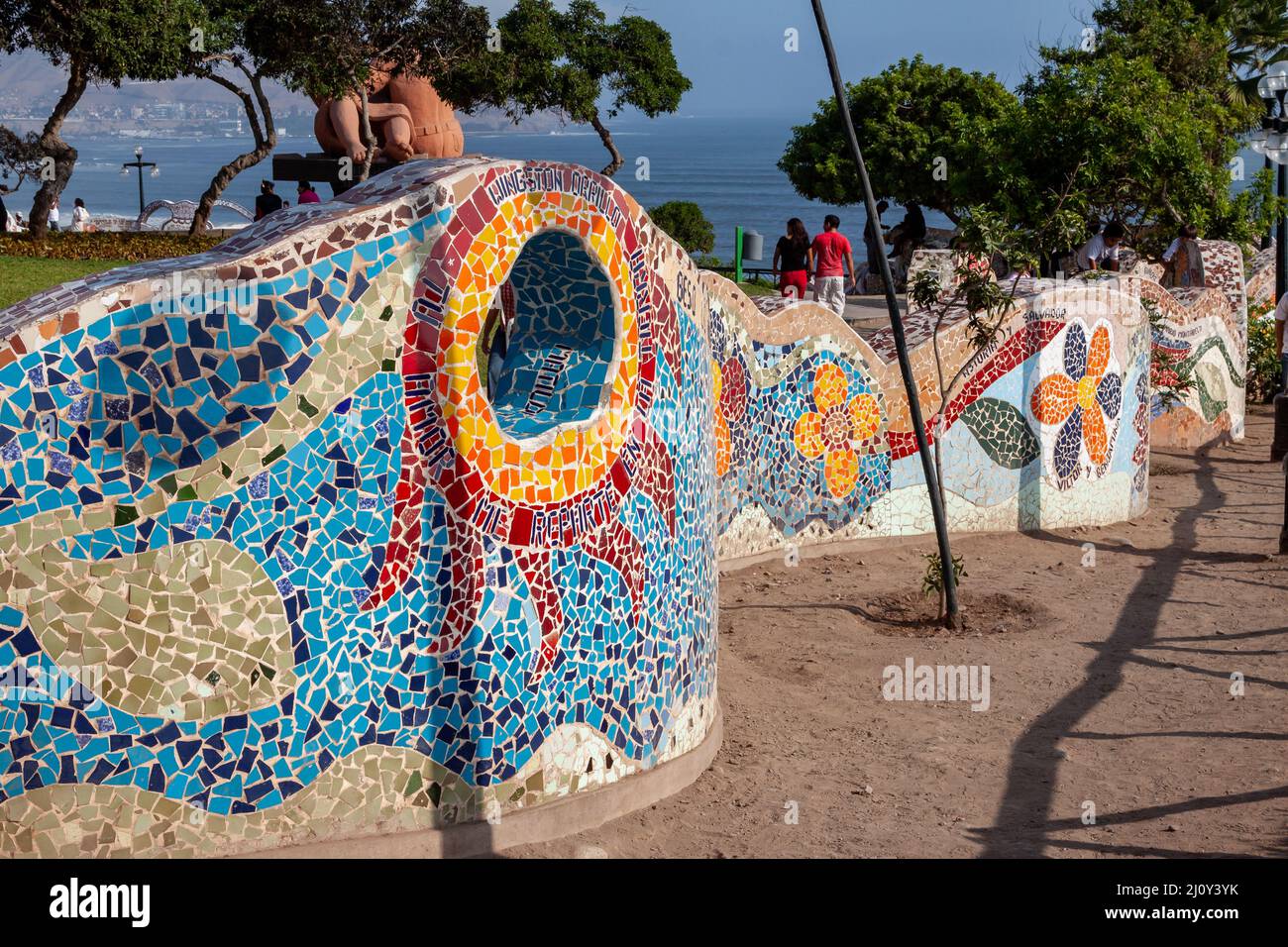 Colorful mosaic bench in Park of Love (Parque del Amor) with the ocean ...