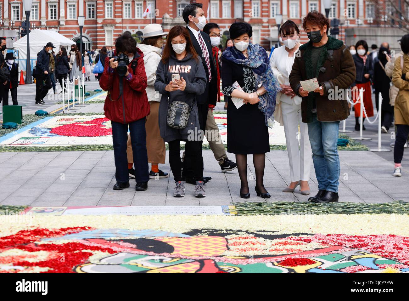 Tokyo, Japan. 21st Mar, 2022. Tokyo Governor Yuriko Koike (wearing a ...
