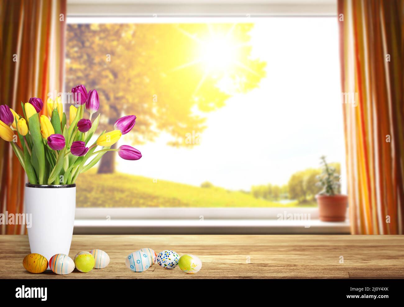 Beautiful Easter background with colorful tulips and easter eggs Stock ...
