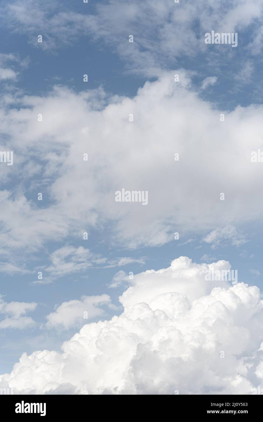 Fluffy clouds sky vertical shot. High quality photo Stock Photo - Alamy
