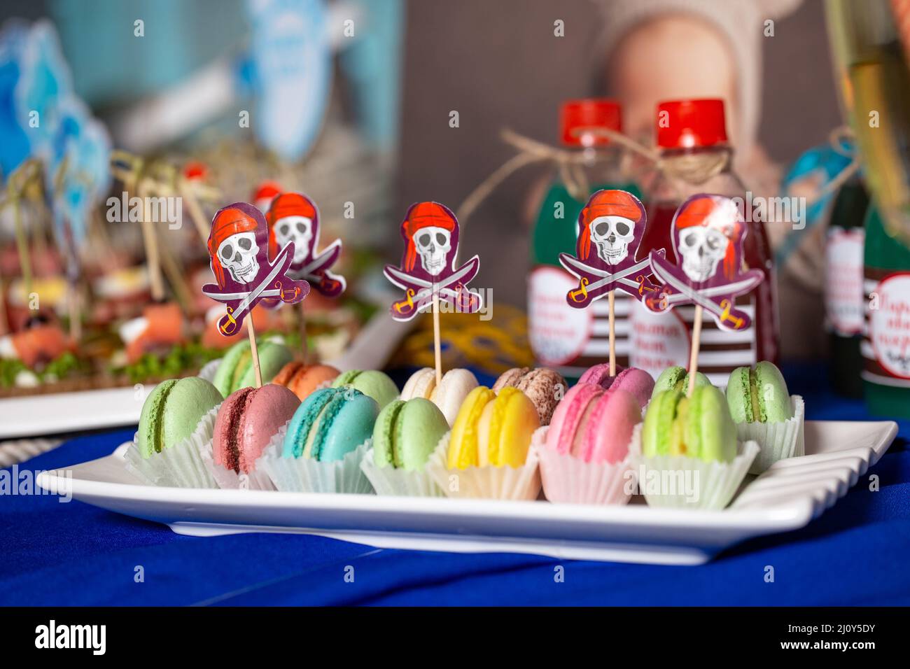 Colorful macaroons at candy bar at children's party Stock Photo - Alamy