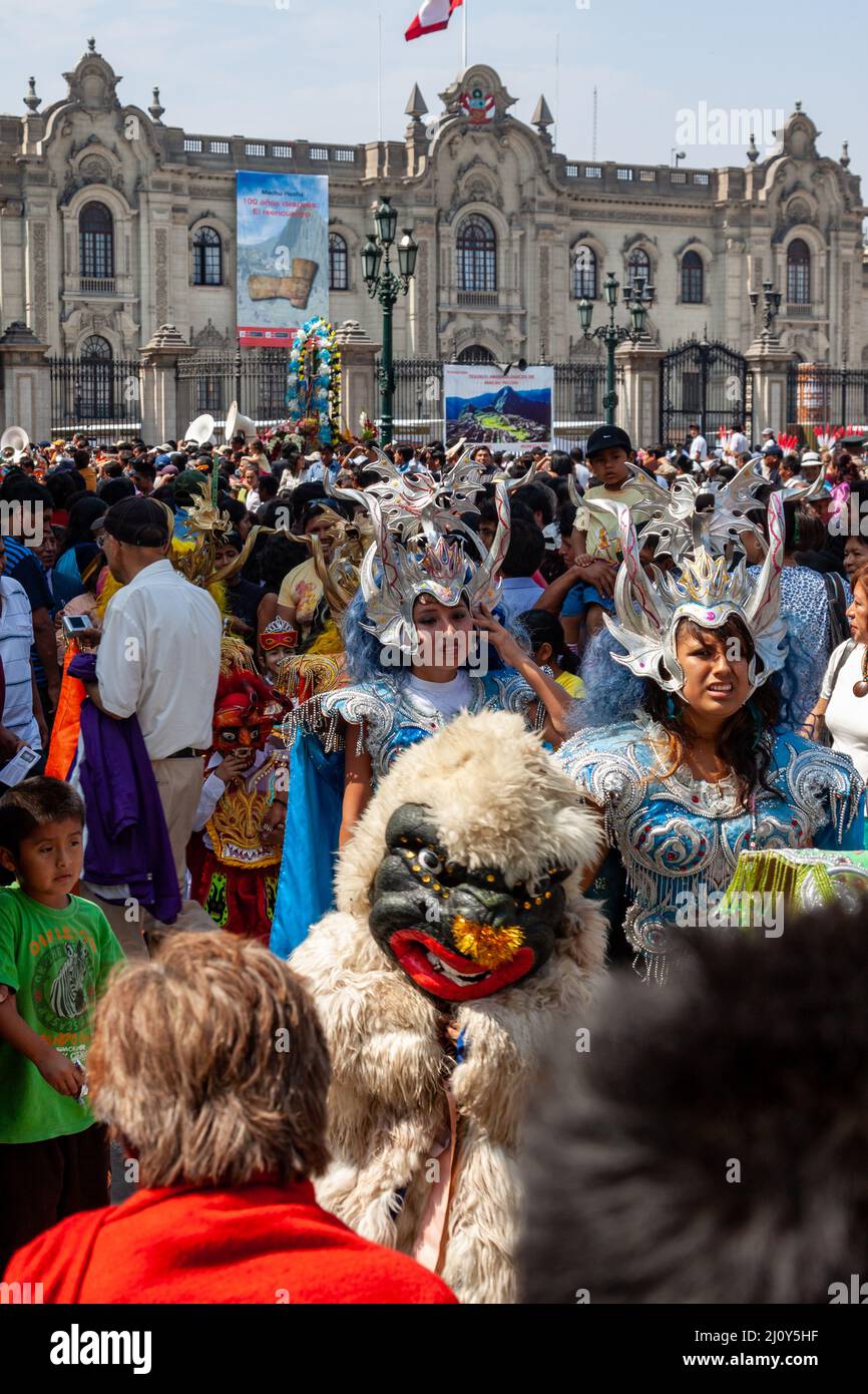 People in customs at Carnival in Plaza de Armas, Lima, Peru Stock Photo ...