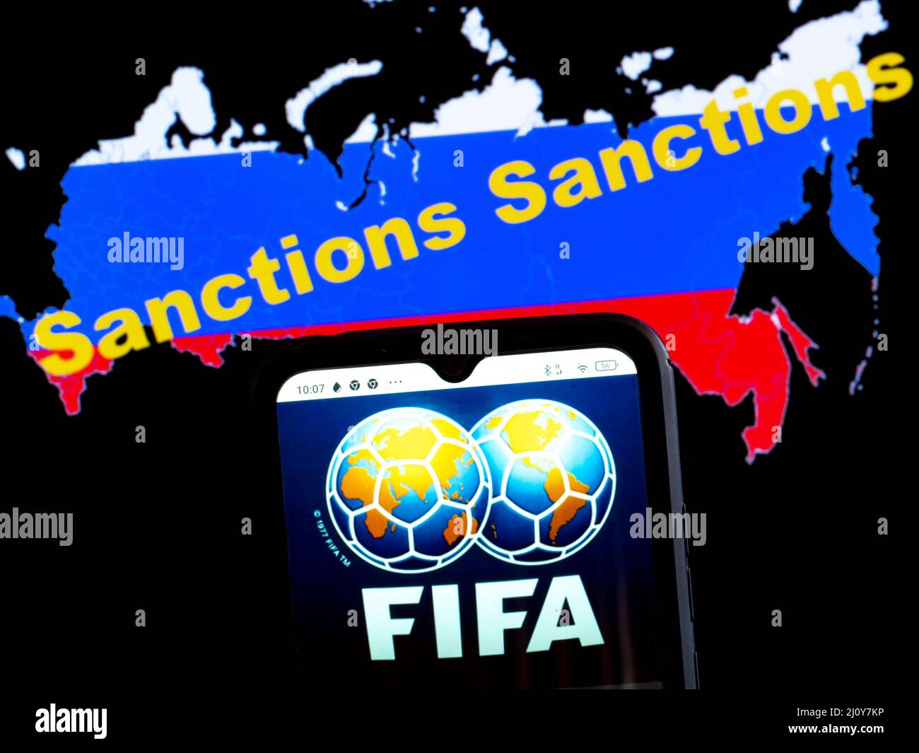 In this photo illustration, the FIFA logo is displayed on a smartphone ...