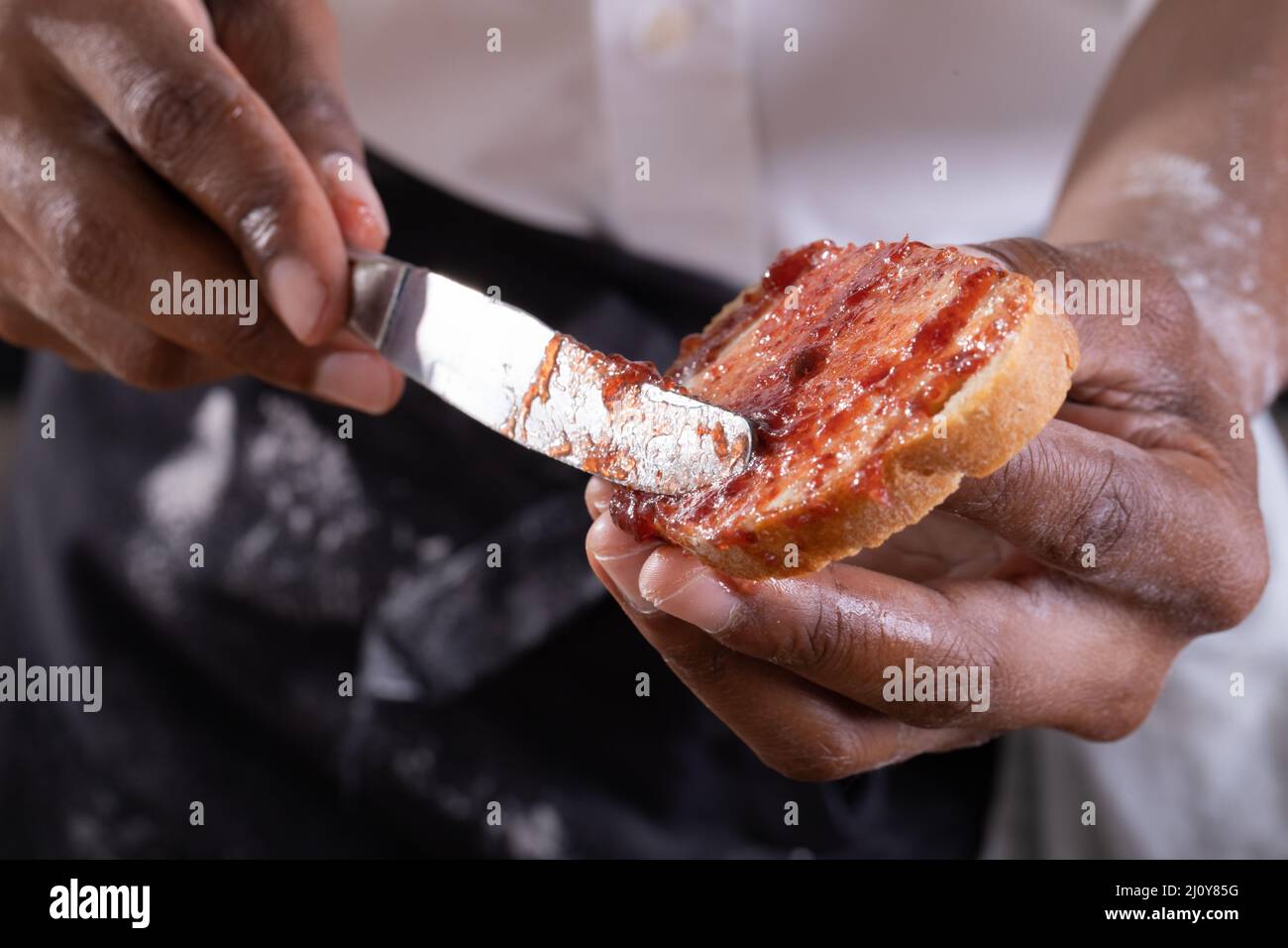 Midsection african american male baker hi-res stock photography and ...