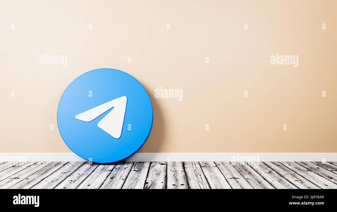 Telegram Logo on Wooden Floor Against Wall Stock Photo - Alamy