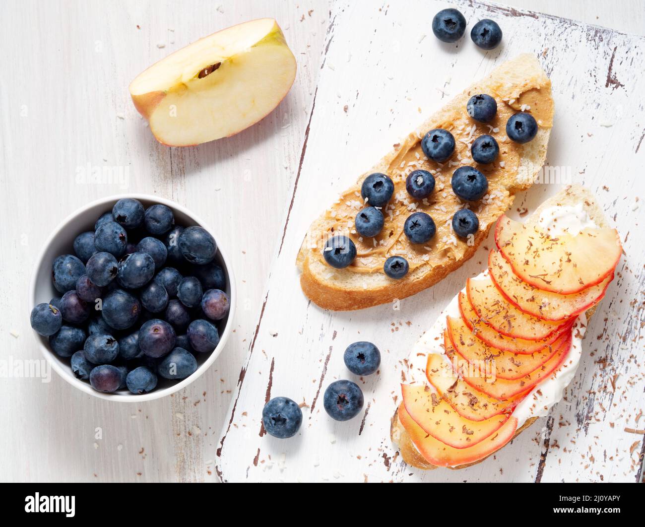Healthy breakfast with sweet sandwiches - ricotta, blueberries, apple ...
