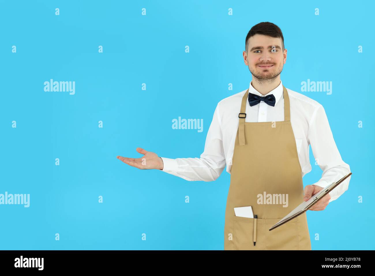 Concept of profession with young man waiter Stock Photo - Alamy