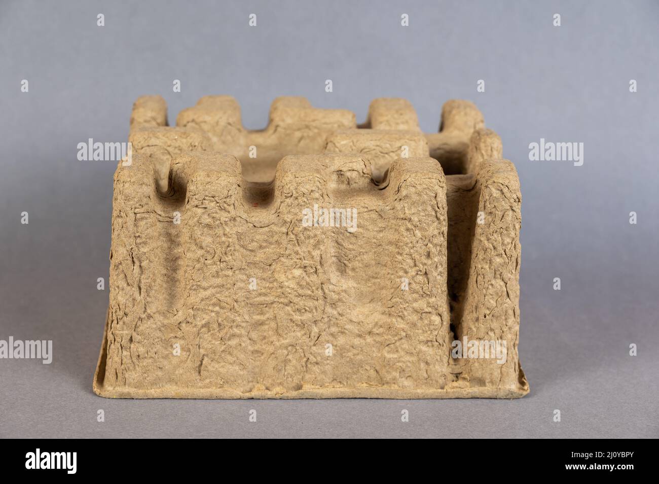 Empty brown container of pressed cardboard. Sealer or recycling tray ...