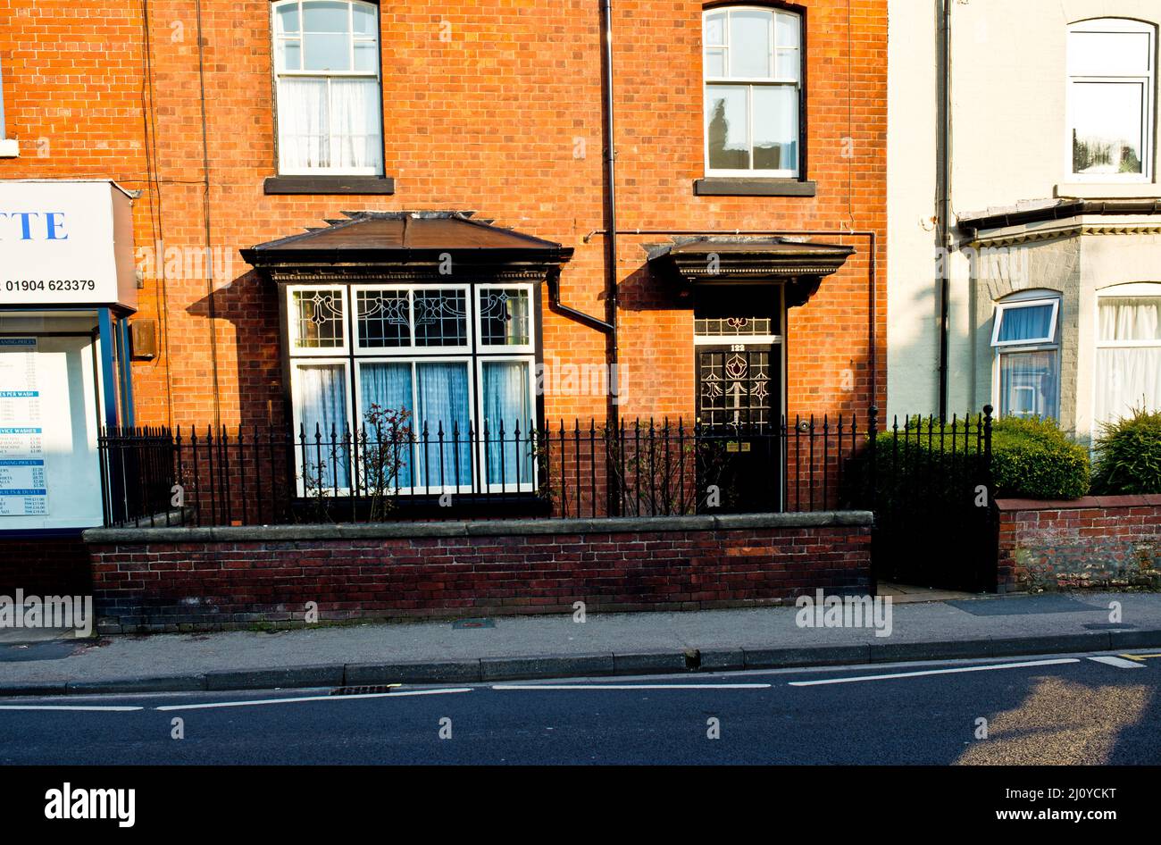 Terrace House with original stained glass wood windows, York, England ...