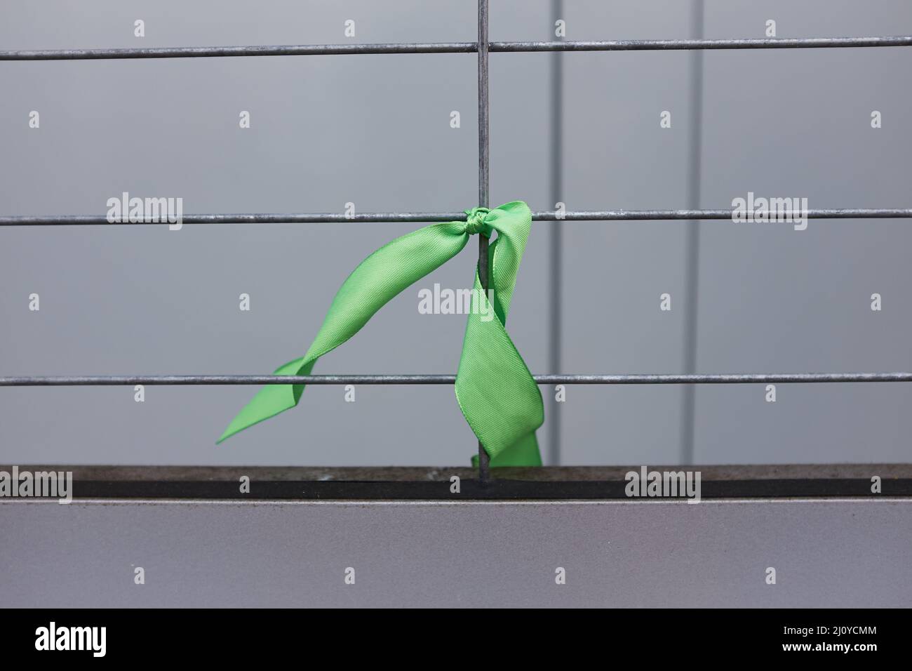 Green ribbon in honor of anti-war action in Russia against military ...