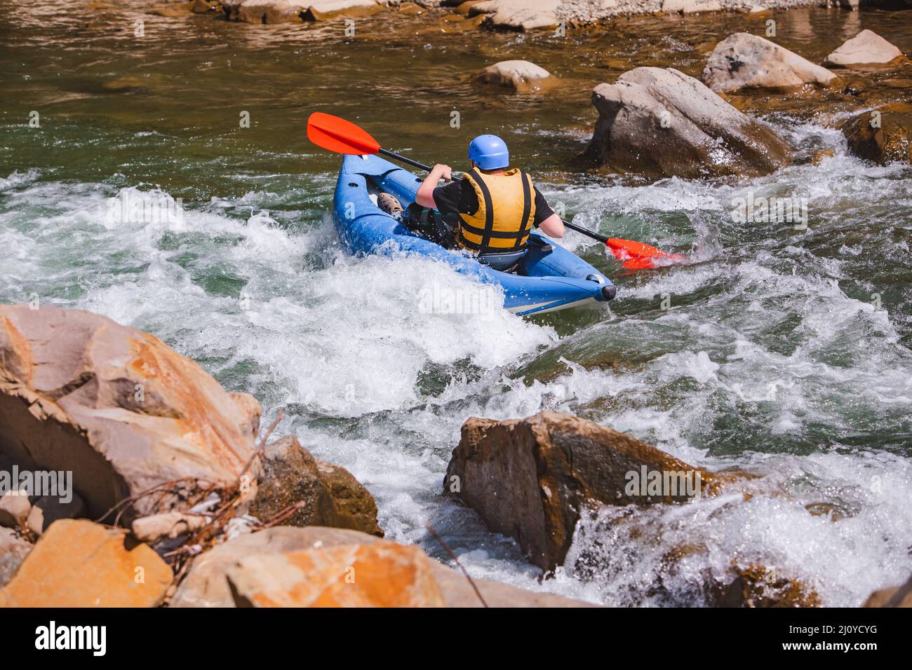inflatable raft extreme sport at mountain river Stock Photo - Alamy