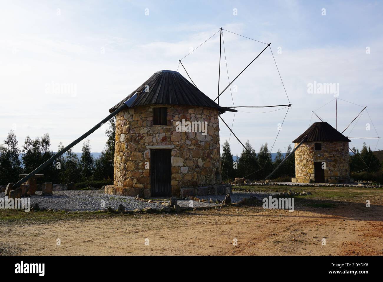 Rustic ancient windmills on top of mountain Stock Photo - Alamy