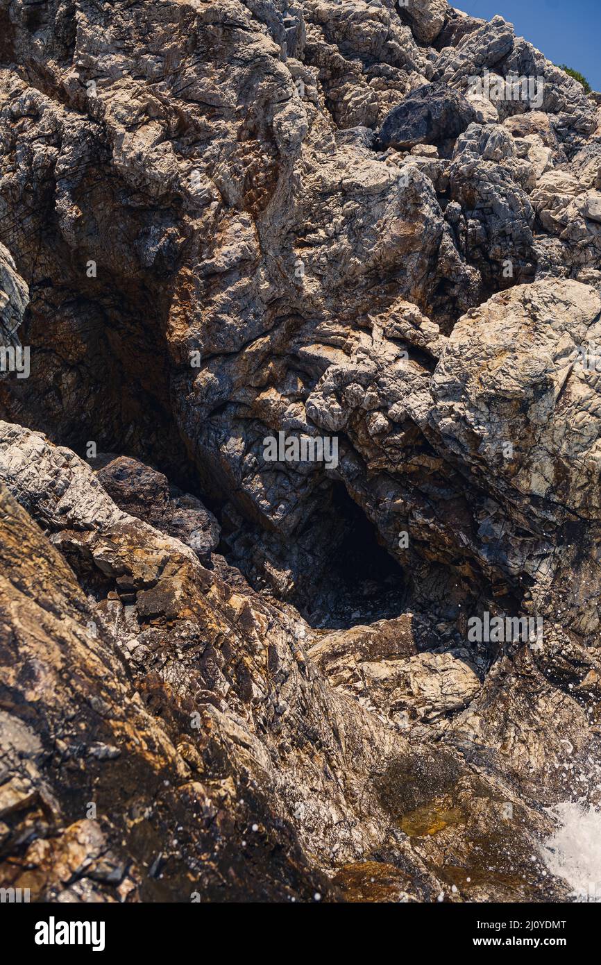 Wonderful views of the blue Mediterranean Sea. Sunny rocks, waves with ...