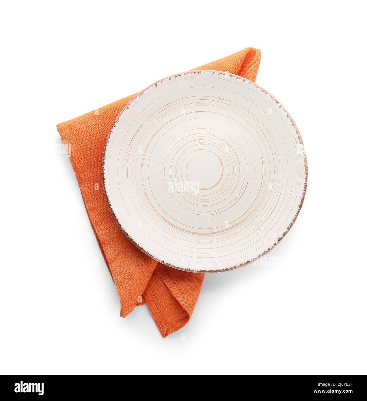 Plate with napkin on white background Stock Photo - Alamy