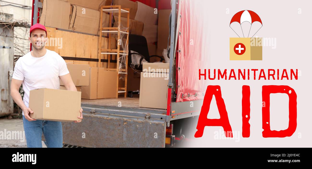 Loader near truck with freight. Humanitarian aid Stock Photo - Alamy
