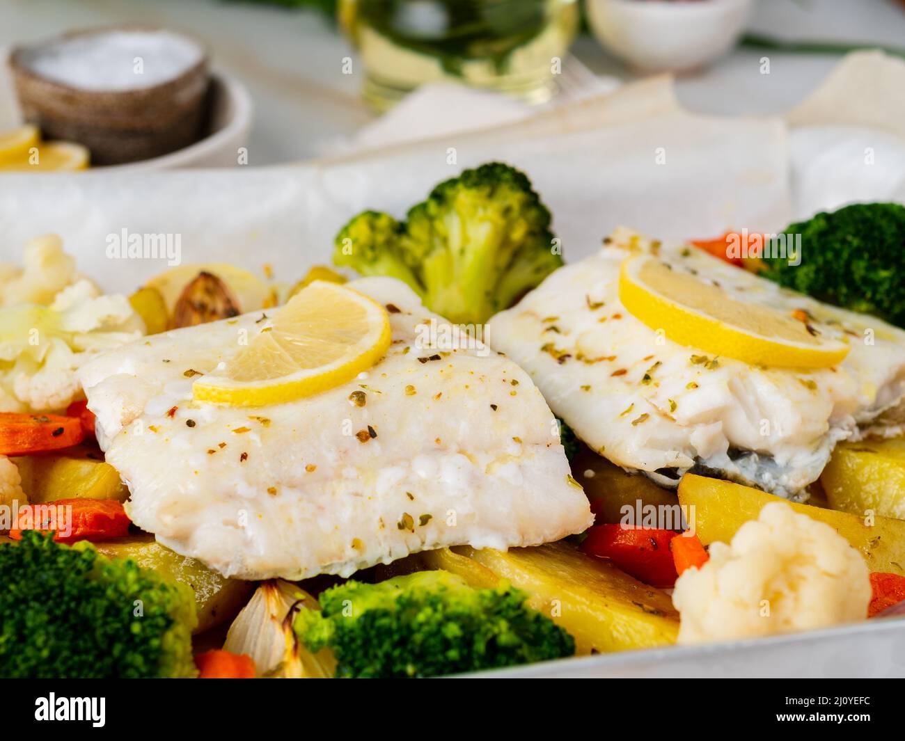 Fish cod baked with vegetables - healthy diet healthy food. Light white ...