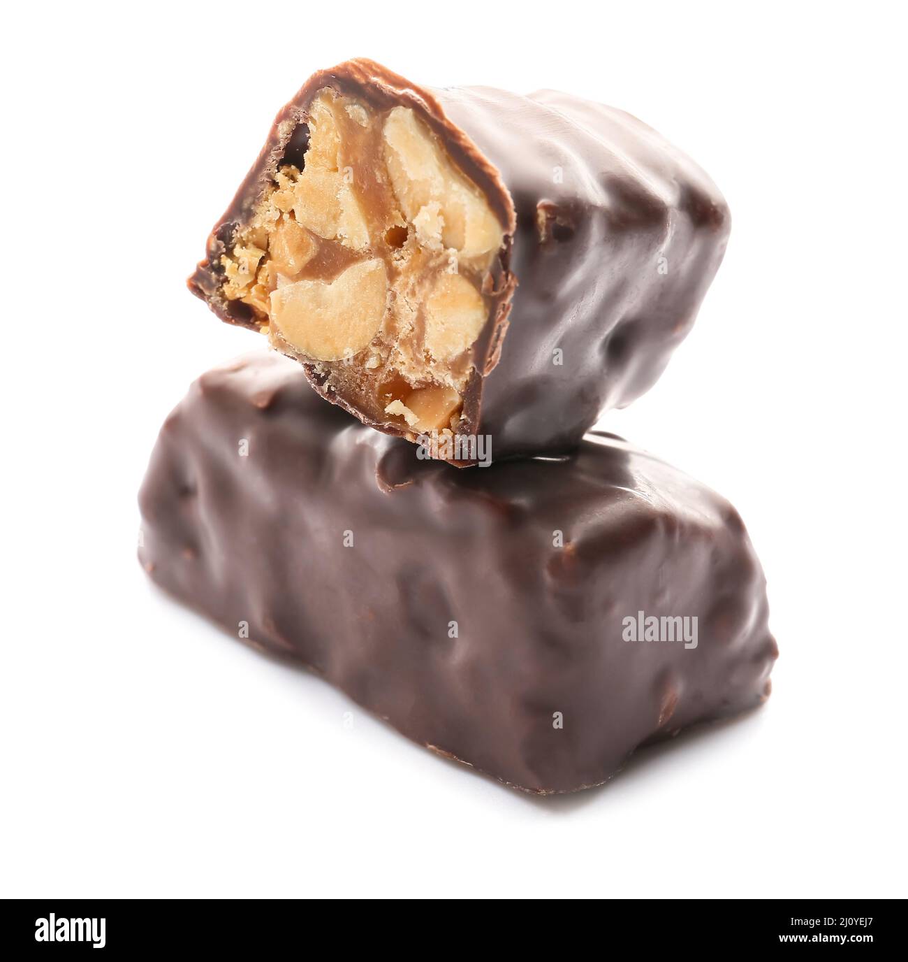 Tasty chocolate candies with nuts isolated on white Stock Photo - Alamy