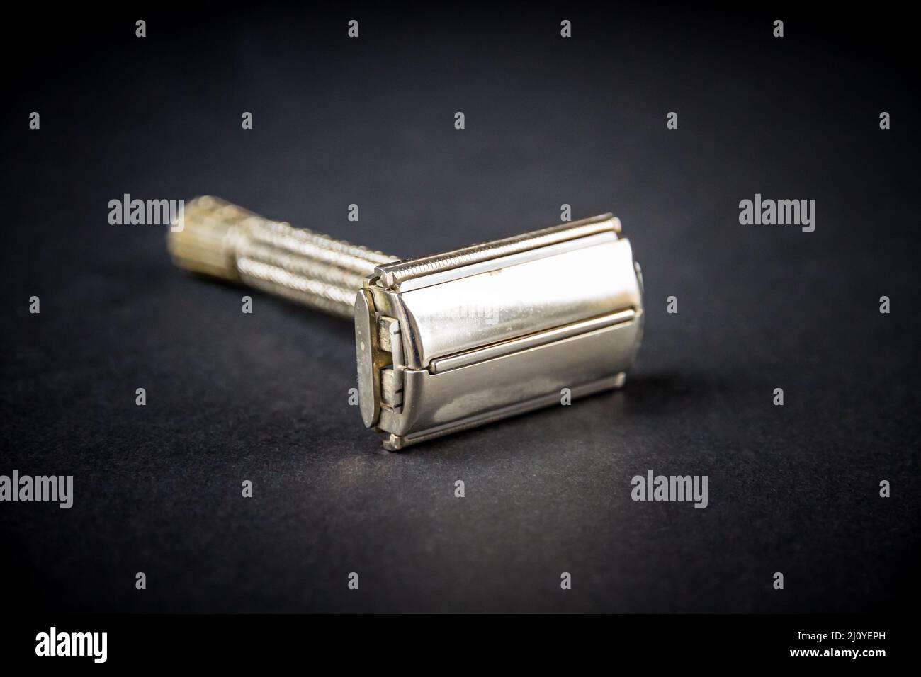 Old classic vintage shaver razor on a black background Stock Photo - Alamy