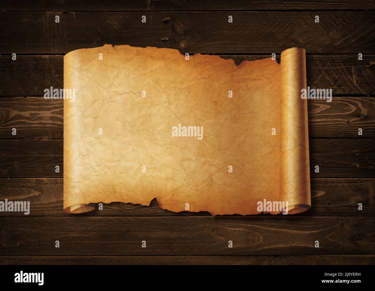 Old mediaeval paper sheet. Horizontal parchment scroll on a wood board ...