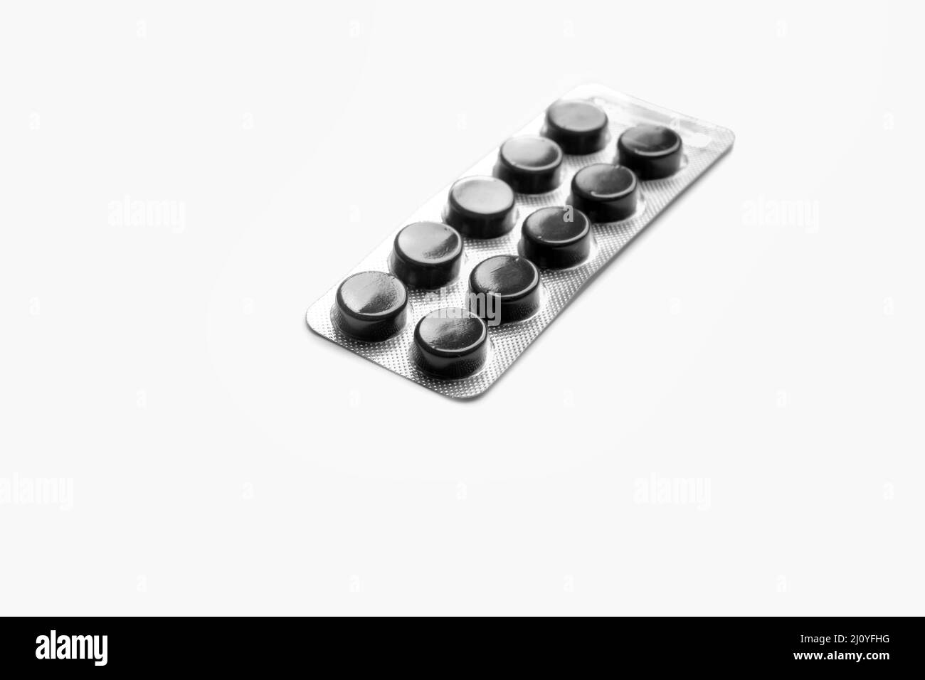 Blister package of activated carbon pills on white background Stock ...