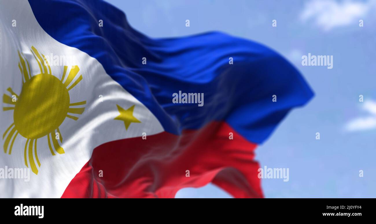 Detail of the national flag of Philippines waving in the wind on a ...